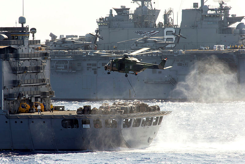 HMAS Canberra chopper prepares to take a load | The Australian Naval ...
